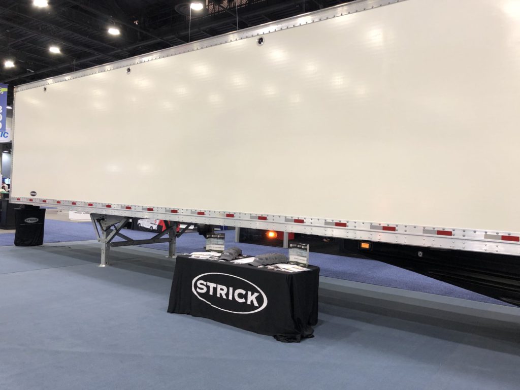 Strick trailer at trade show | Strick Trailers